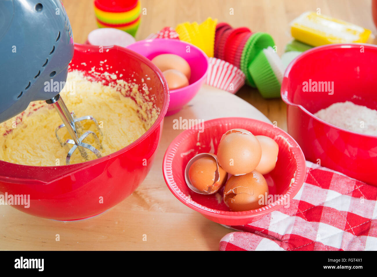 Baking cupcakes with metal form and paper models Stock Photo - Alamy