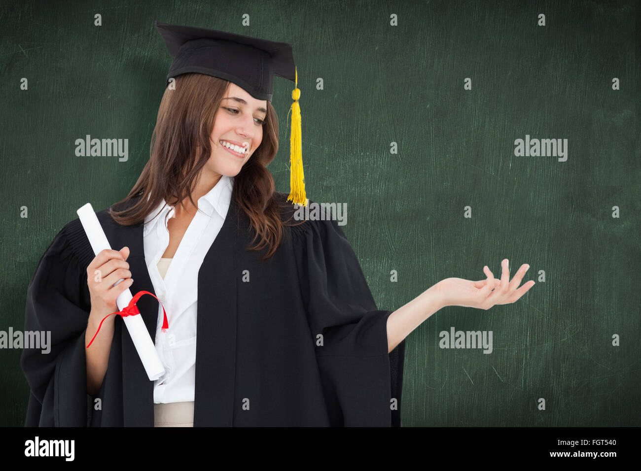 Composite image of a woman holding her hand out with a degree in her ...