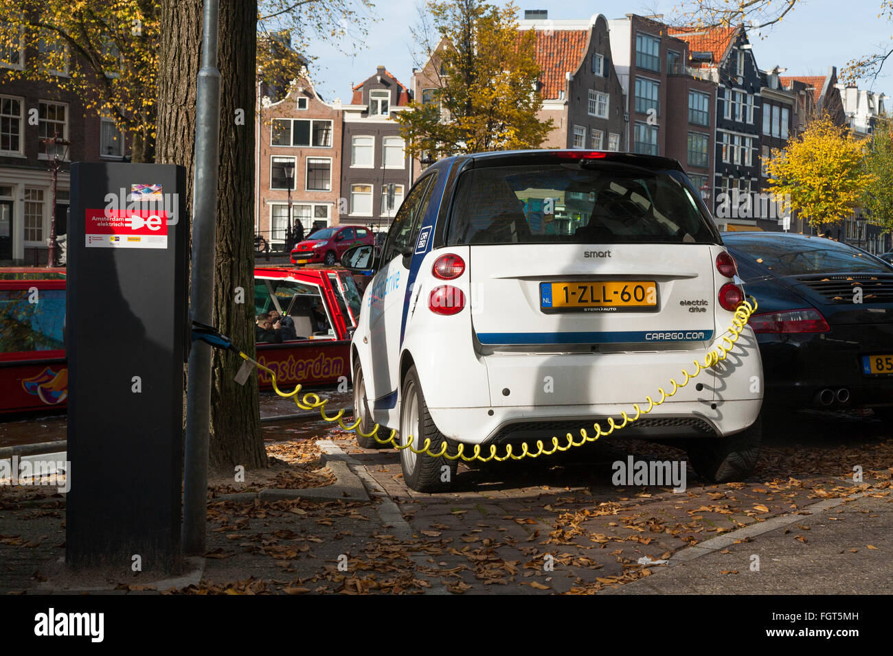 EV / Electric car / electrically powered cars being charged / having ...