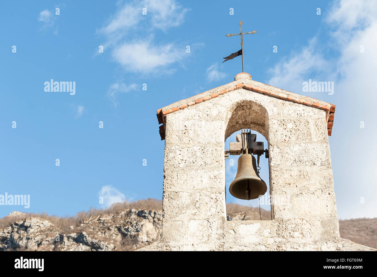 Small bell tower with a bell of a country church in the 15th century ...