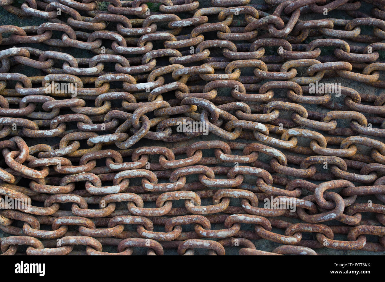 Large chain-link chains with rust Stock Photo - Alamy