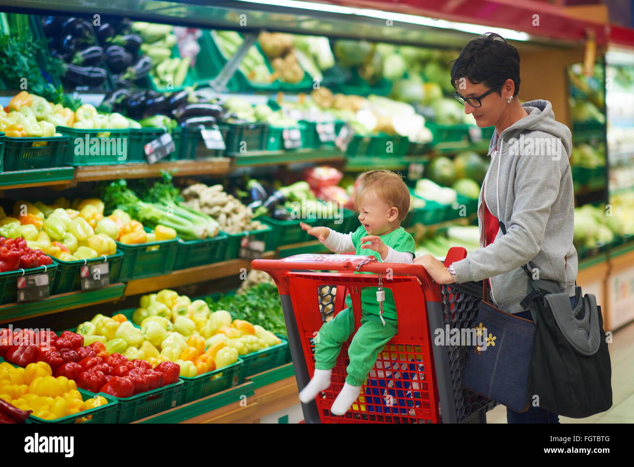mother with baby in shopping Stock Photo - Alamy