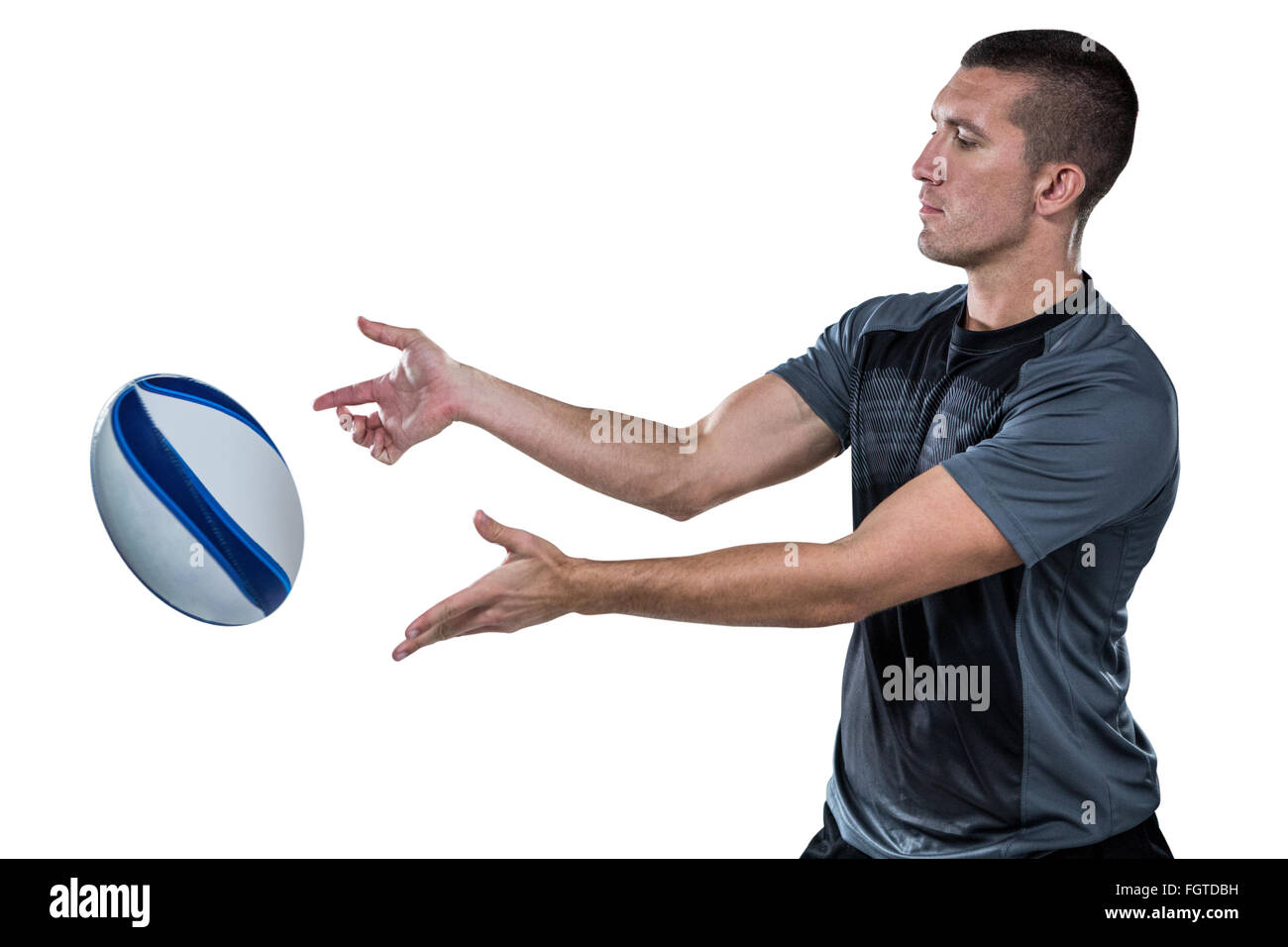 Rugby player catching ball Stock Photo - Alamy