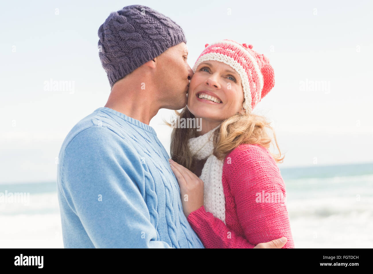 Smiling happy couple hugging each other Stock Photo - Alamy