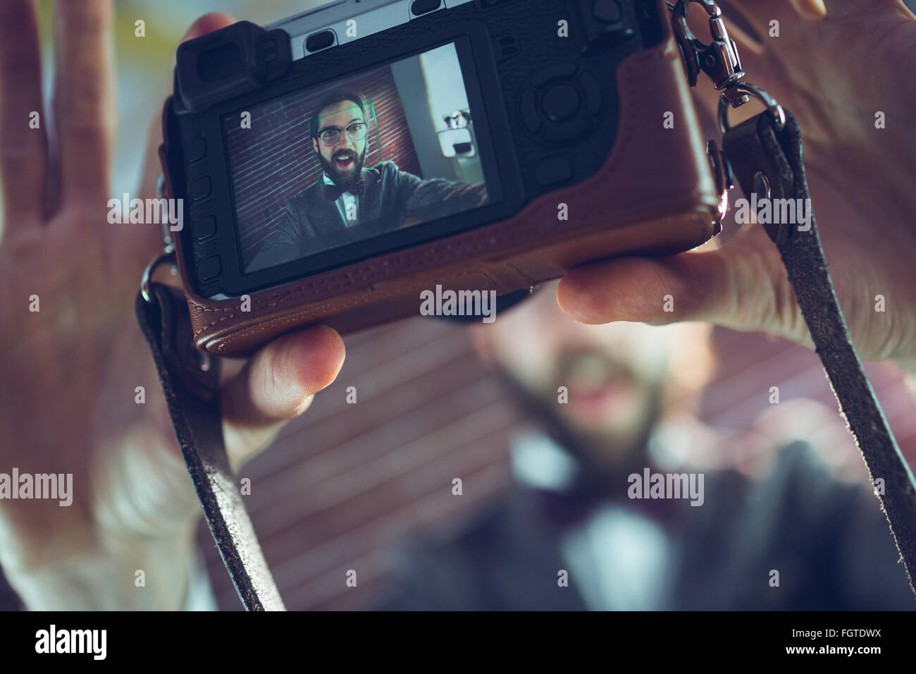 hipster taking self portrait through camera Stock Photo - Alamy