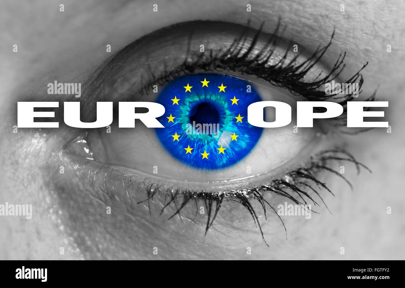 Europe eye looks through flag concept Stock Photo - Alamy