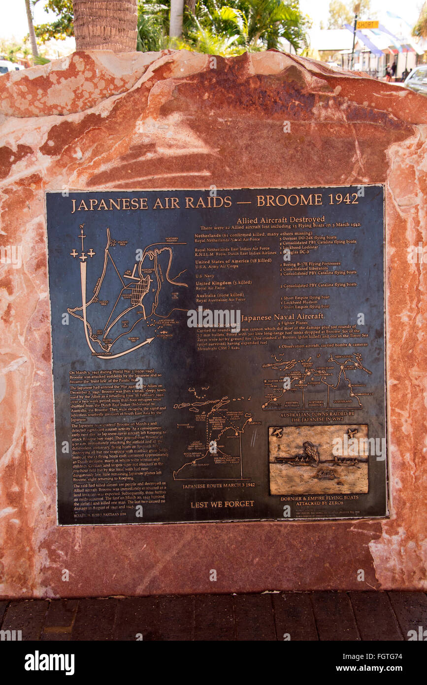 A stone monument and large plaque commemorating. the Japanese Air Raids ...