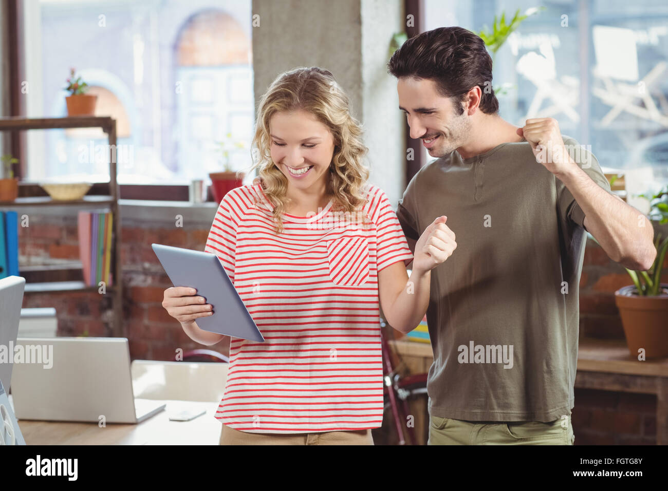 Colleagues cheering hi-res stock photography and images - Alamy