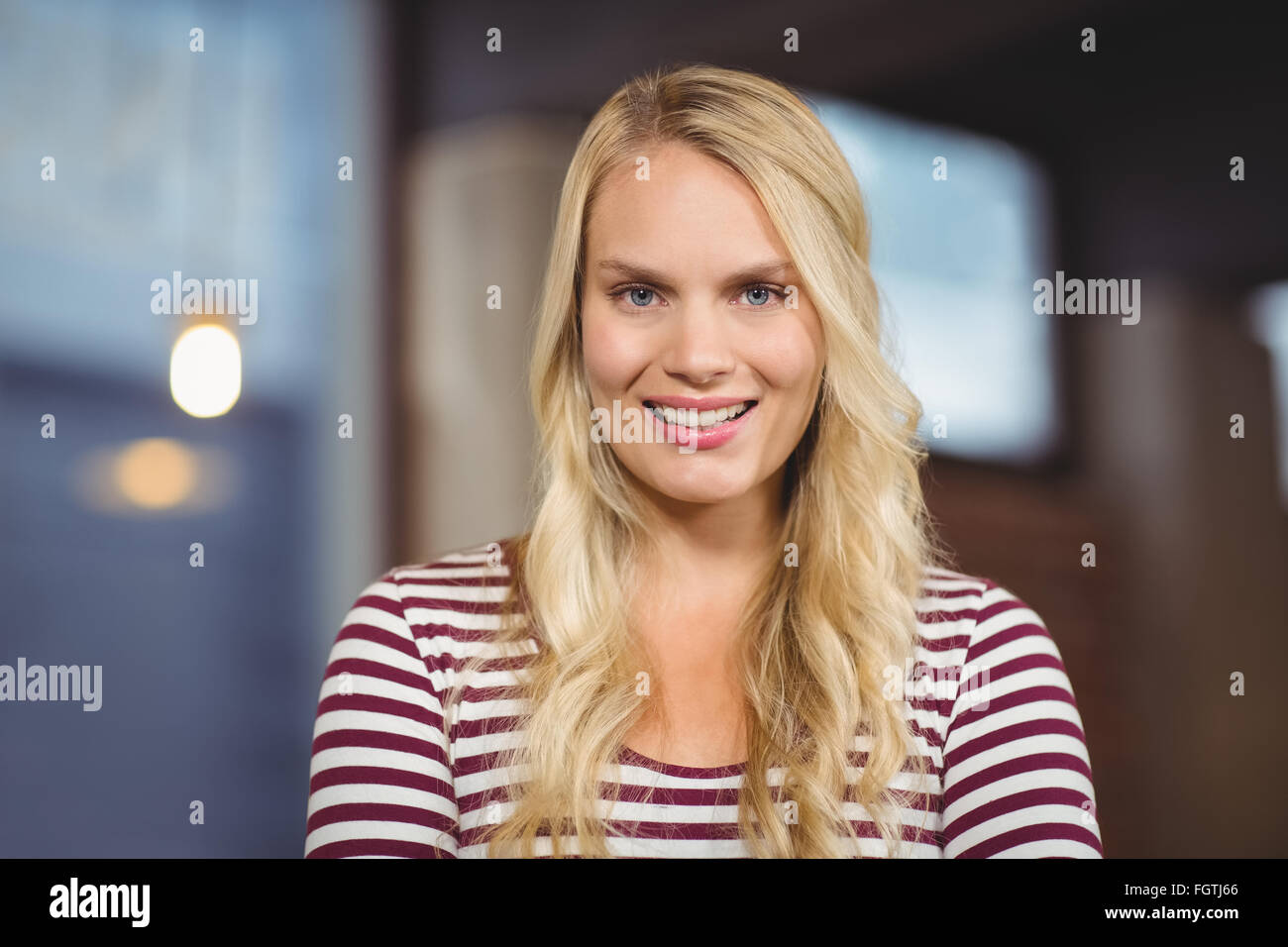 Portrait of smiling happy woman Stock Photo - Alamy