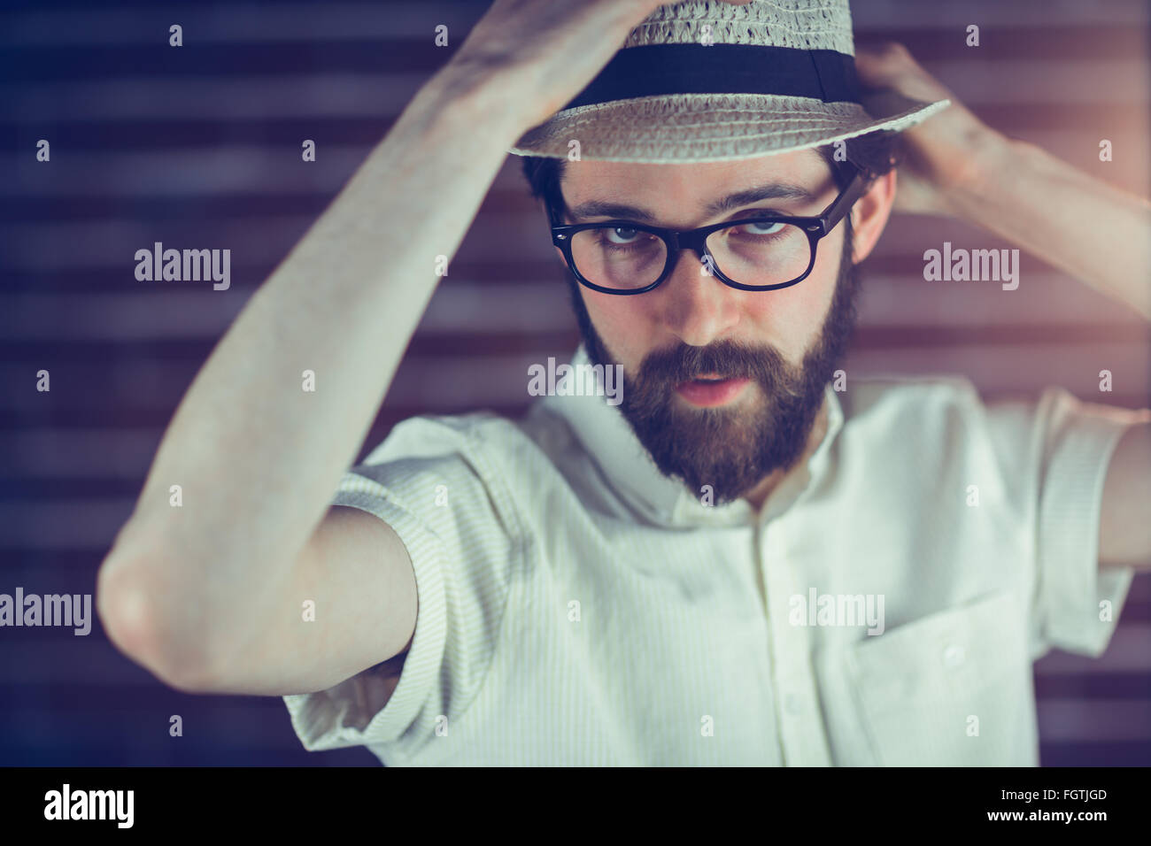 Portrait of handsome man wearing eyeglasses and hat Stock Photo - Alamy