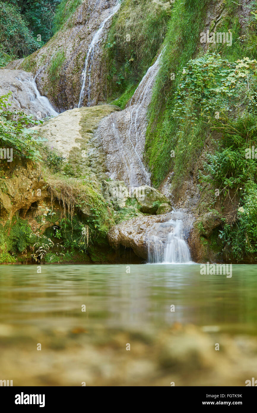 Waterfall in mountains Stock Photo - Alamy