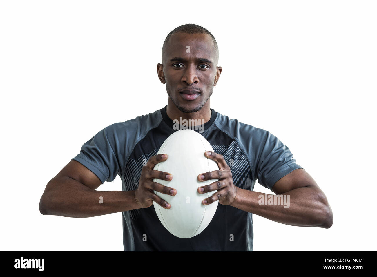 Portrait of athlete pressing rugby ball Stock Photo - Alamy
