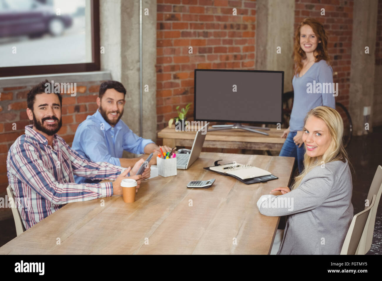 Portrait of happy business colleagues in office Stock Photo - Alamy