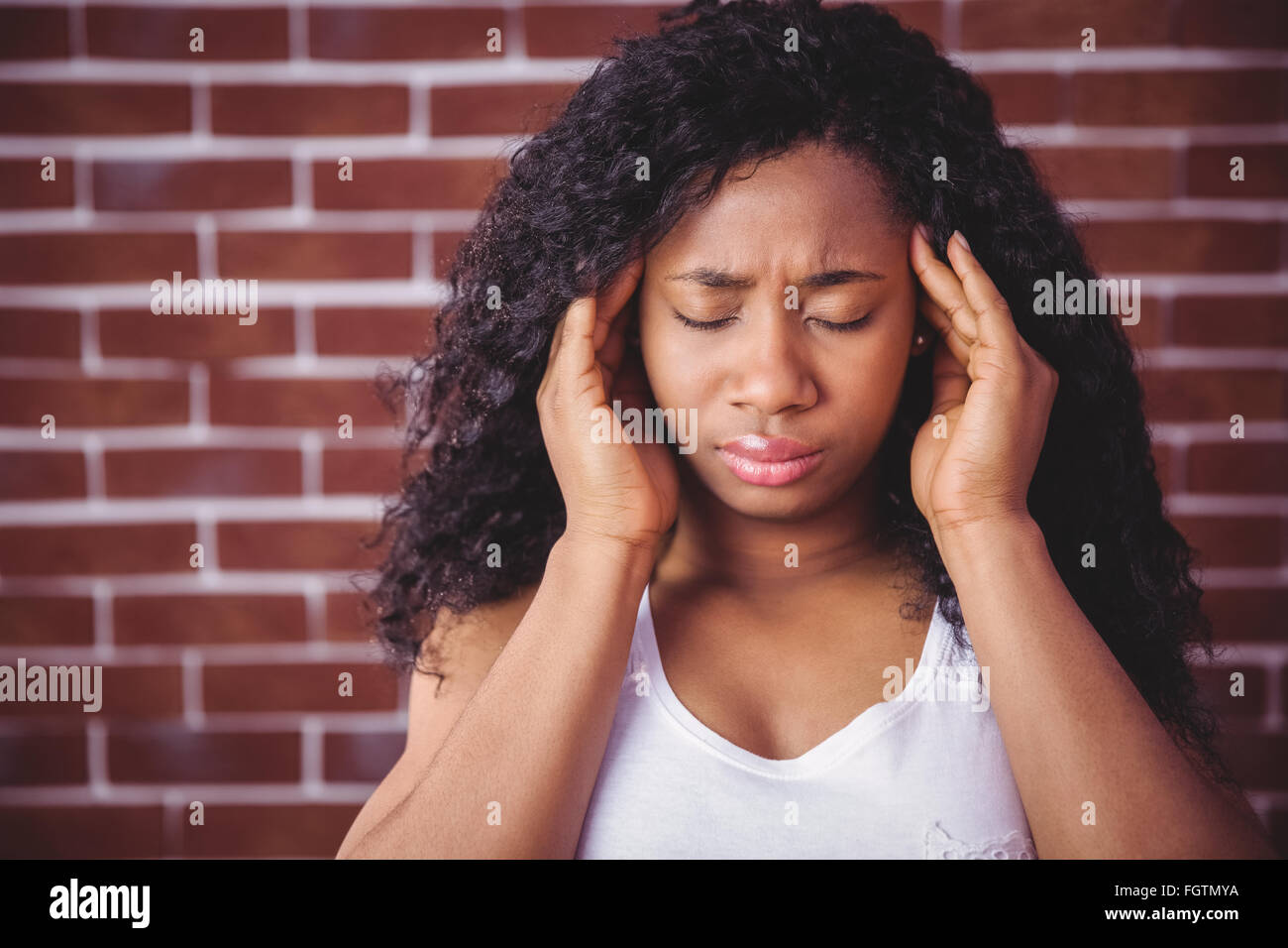 Model getting a headache Stock Photo - Alamy