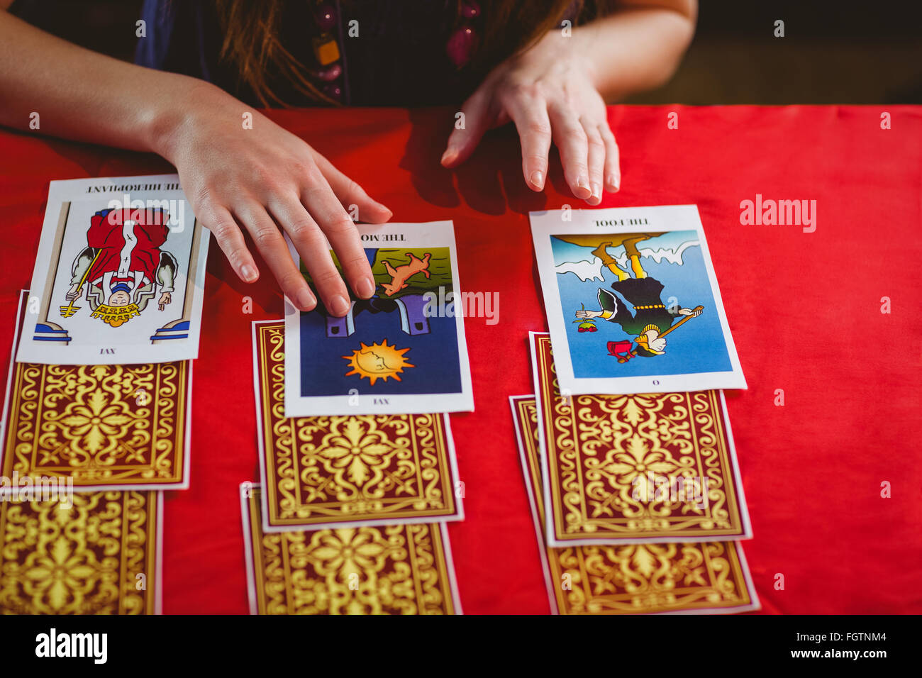 Fortune teller using tarot hi-res stock photography and images - Alamy