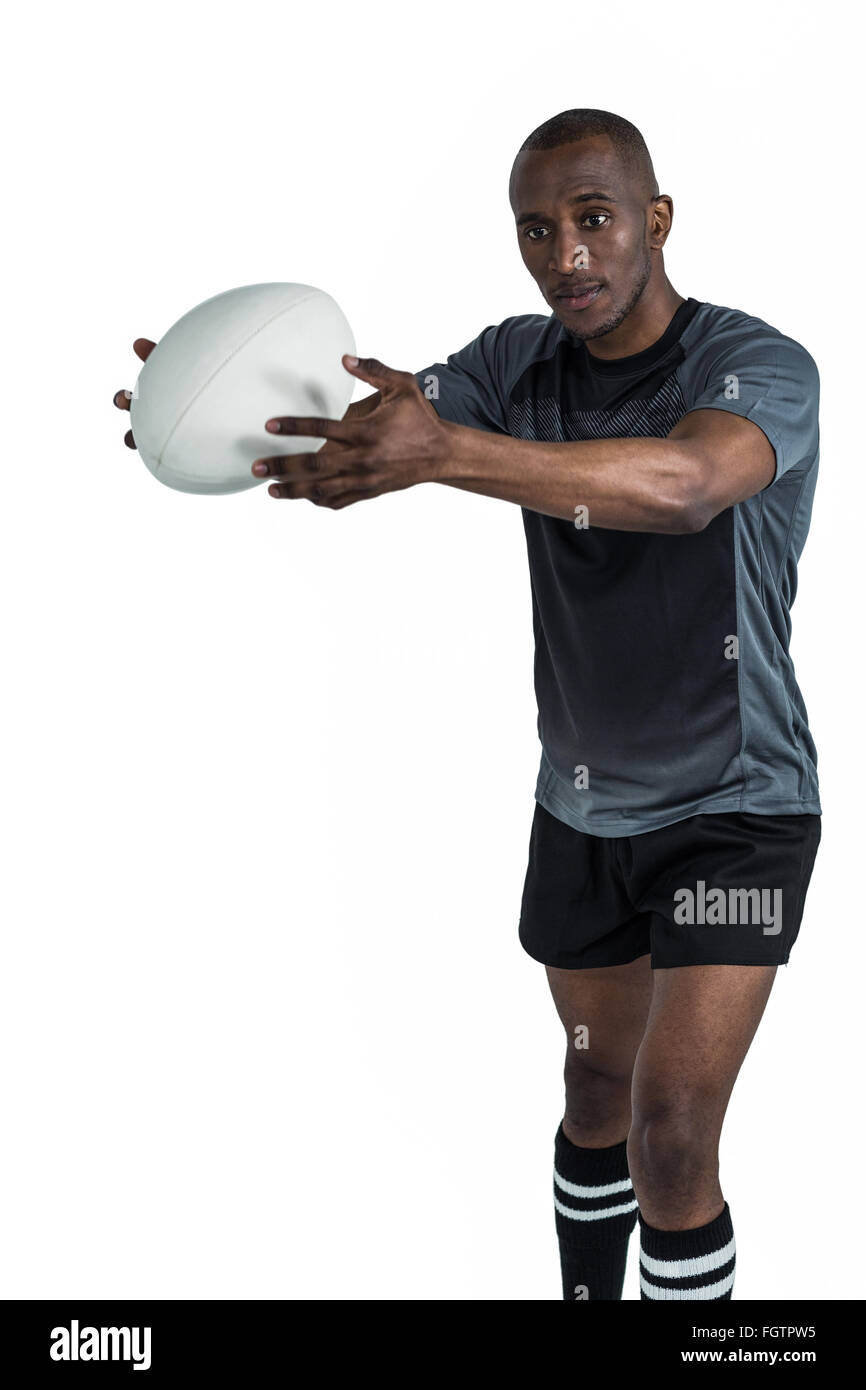 Athlete in position to throw rugby ball Stock Photo - Alamy