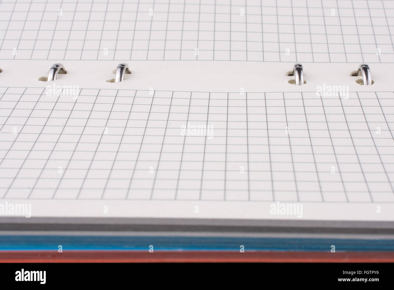 Checked white notebook Stock Photo - Alamy