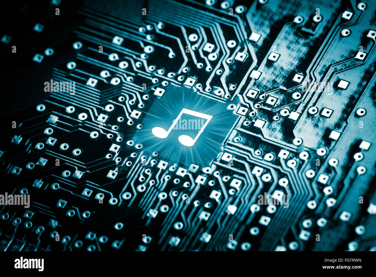 Music note on computer chip Stock Photo - Alamy