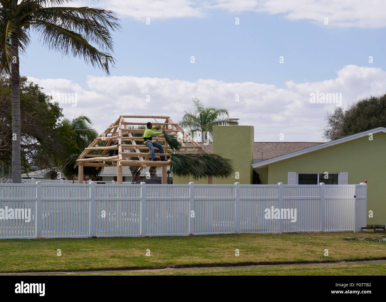 Building a backyard TIKI Hut in Florida Stock Photo - Alamy