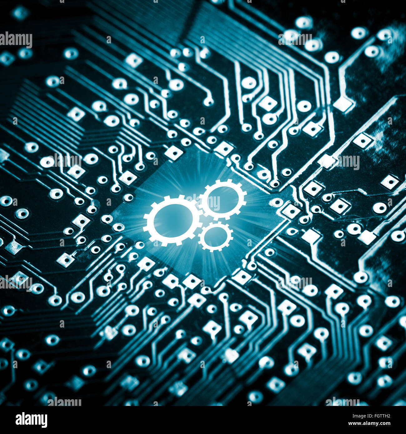 Gears icon on computer chip Stock Photo - Alamy