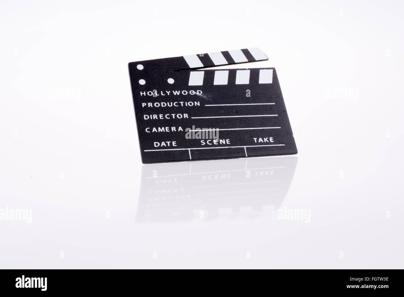 Film clapper on a white background Stock Photo - Alamy