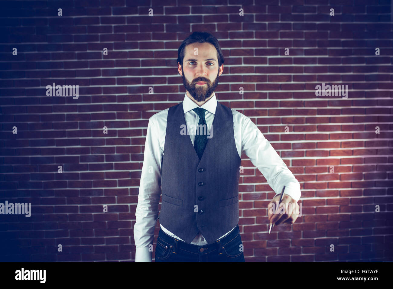 Portrait of man holding pen Stock Photo - Alamy Portrait of man holding pen Stock Photo - Alamy