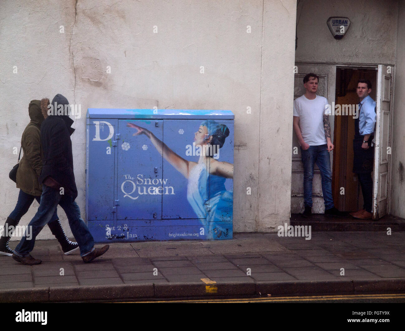 Popping outside for a cigarette in Brighton Stock Photo - Alamy