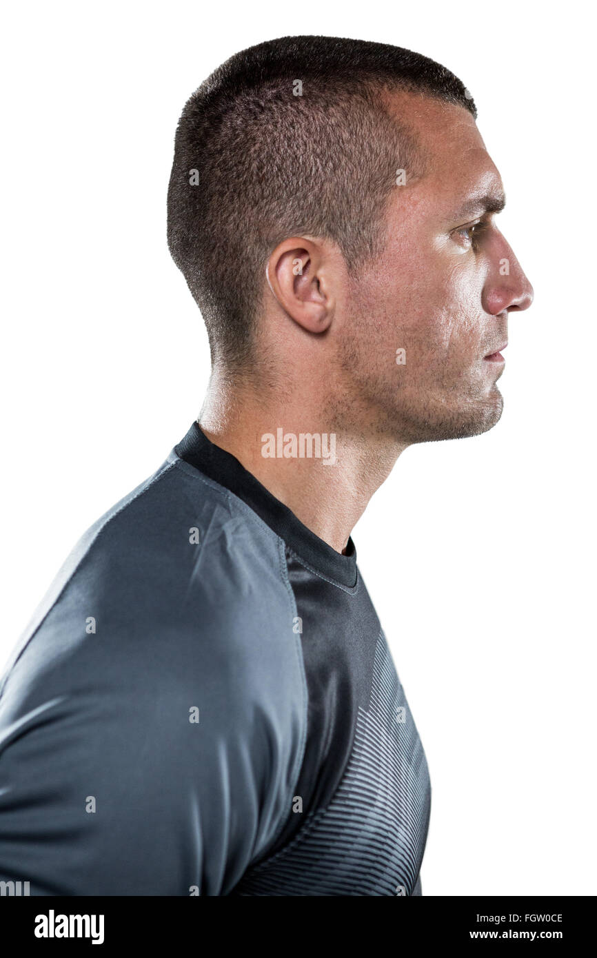 Profile view of serious rugby player Stock Photo - Alamy