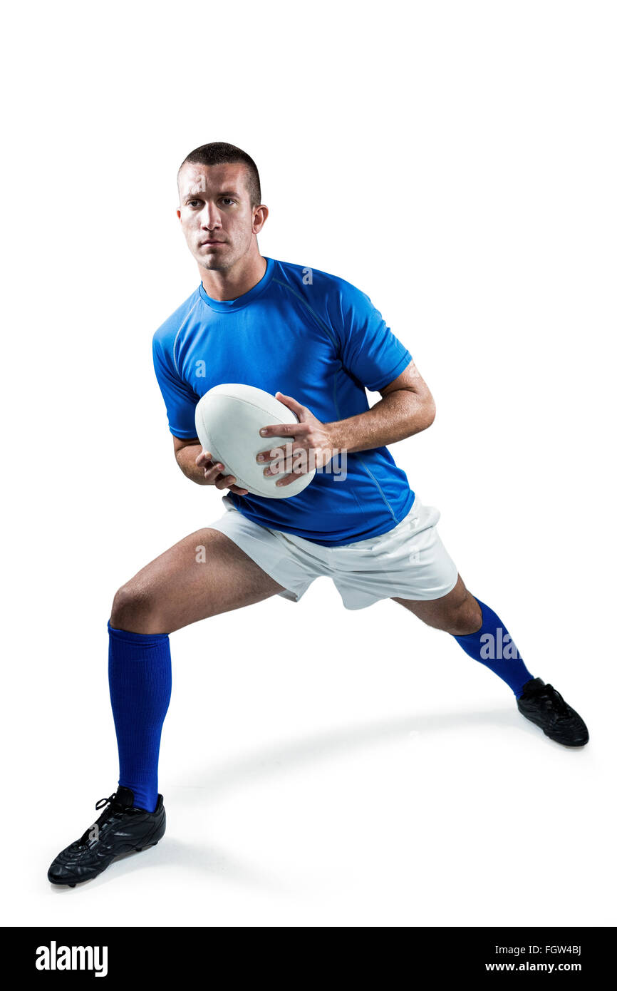 Full length of rugby player exercising with ball Stock Photo - Alamy