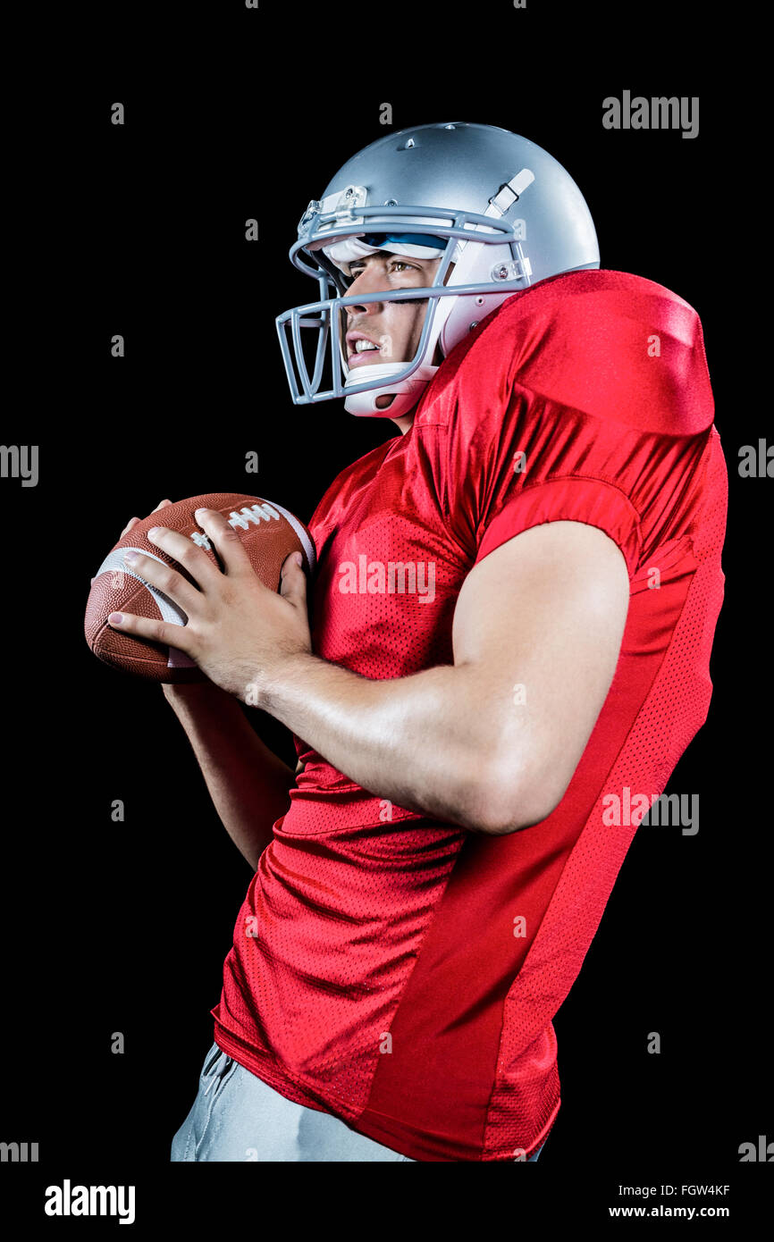 American football player catching ball hi-res stock photography and ...