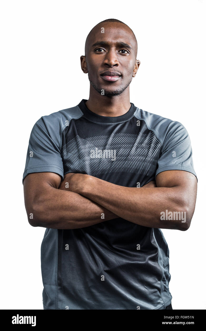 Sportsman with arms crossed Stock Photo - Alamy