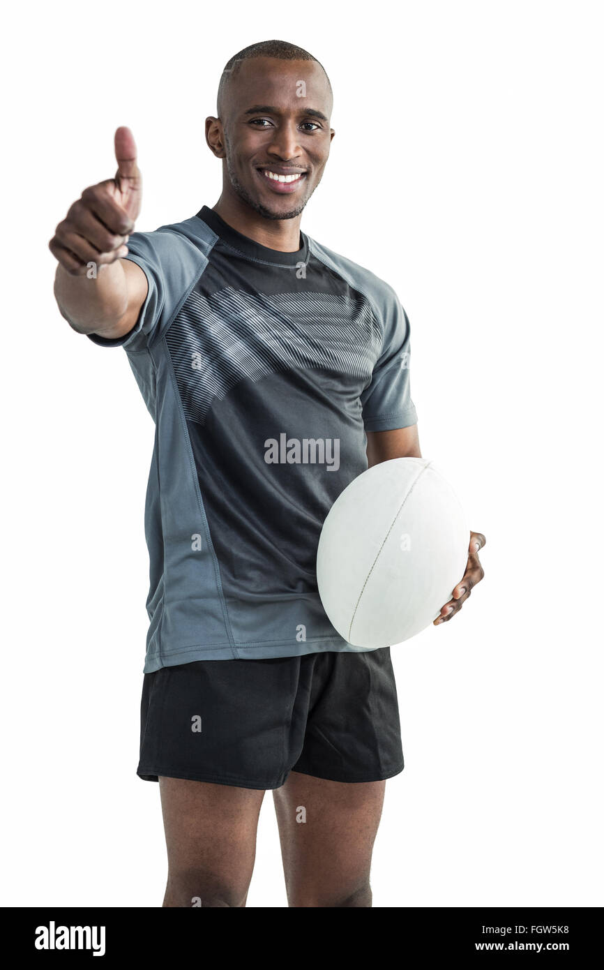 Portrait of confident rugby player smiling and showing thumbs up Stock ...