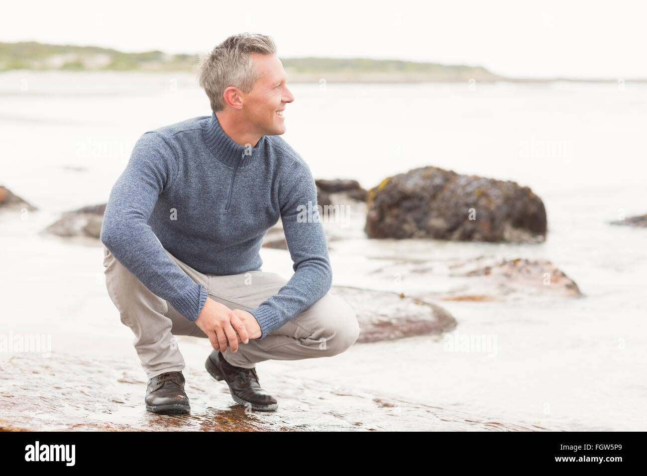 Man crouched down hi-res stock photography and images - Alamy