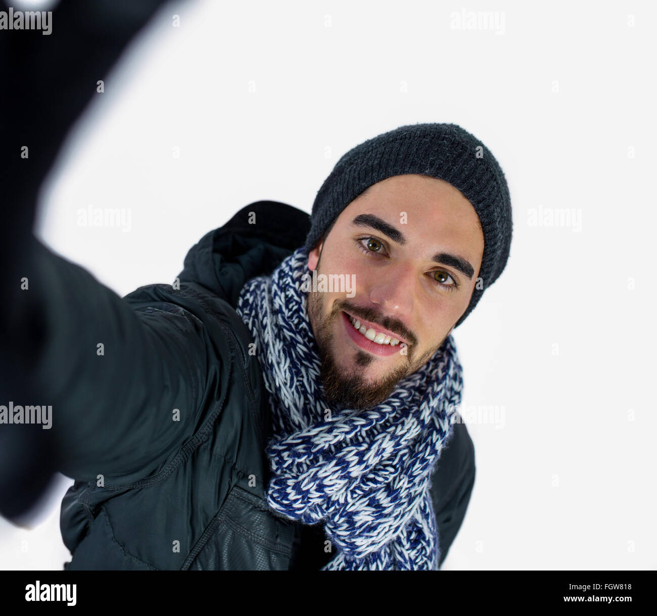 Bearded man using a selfie stick Stock Photo - Alamy