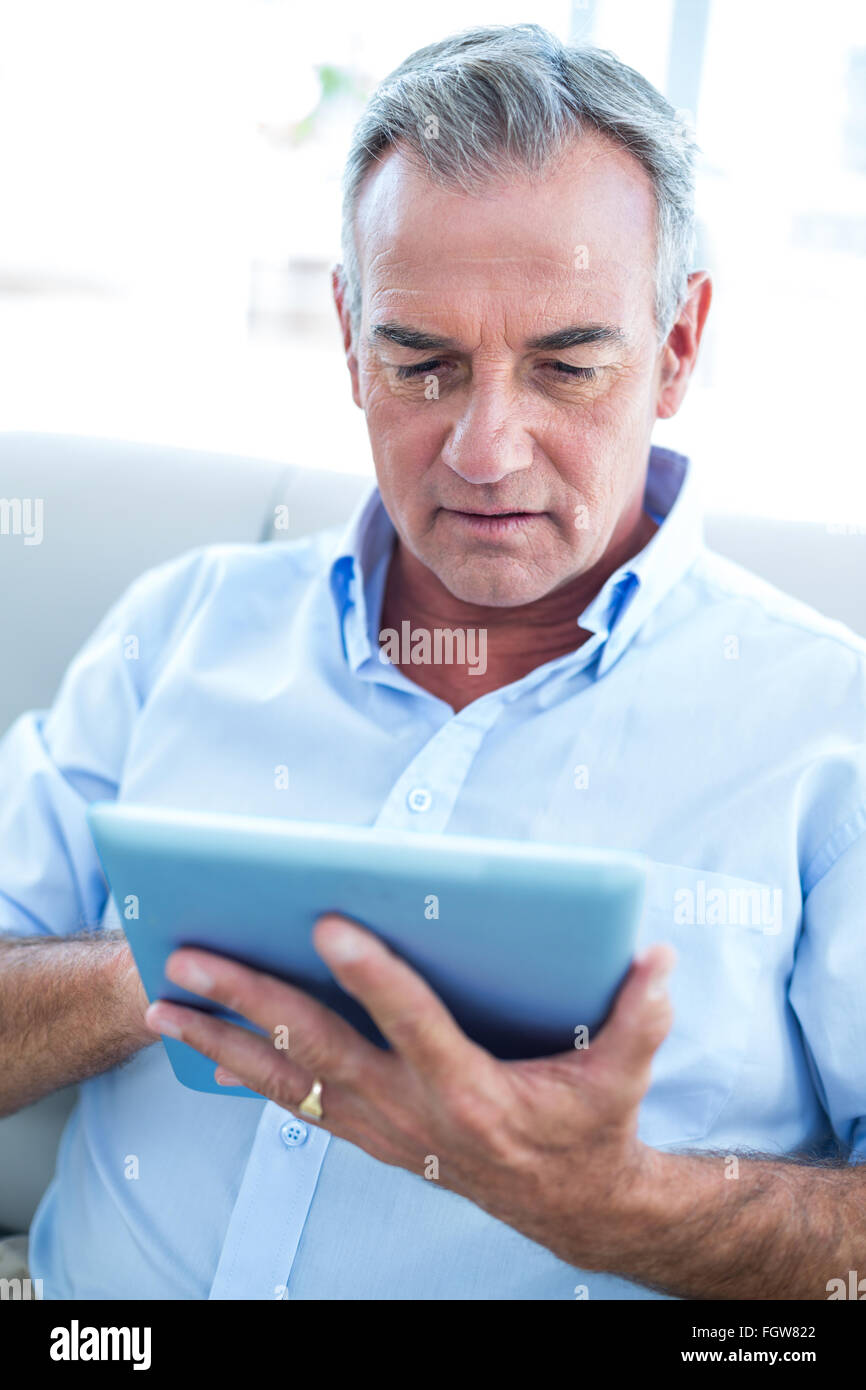Businessman holding digital tablet Stock Photo - Alamy