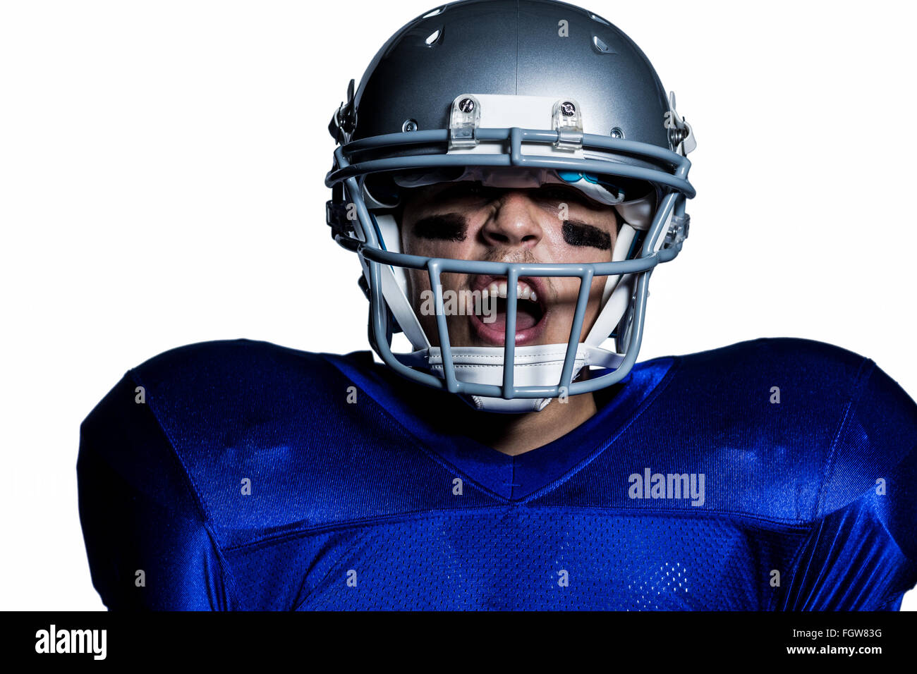 Aggressive American football player Stock Photo - Alamy