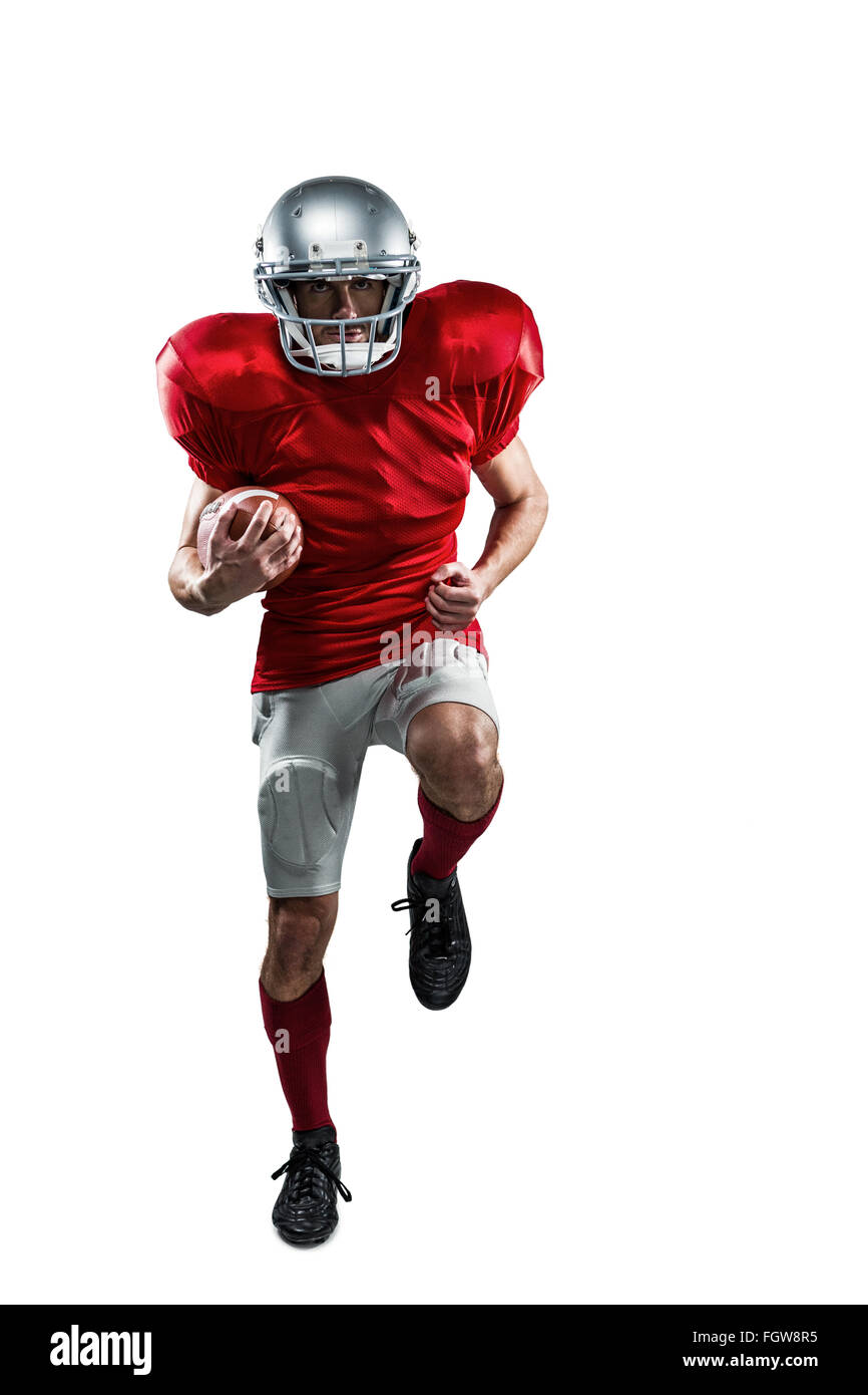 Full length portrait of American football player running Stock Photo ...