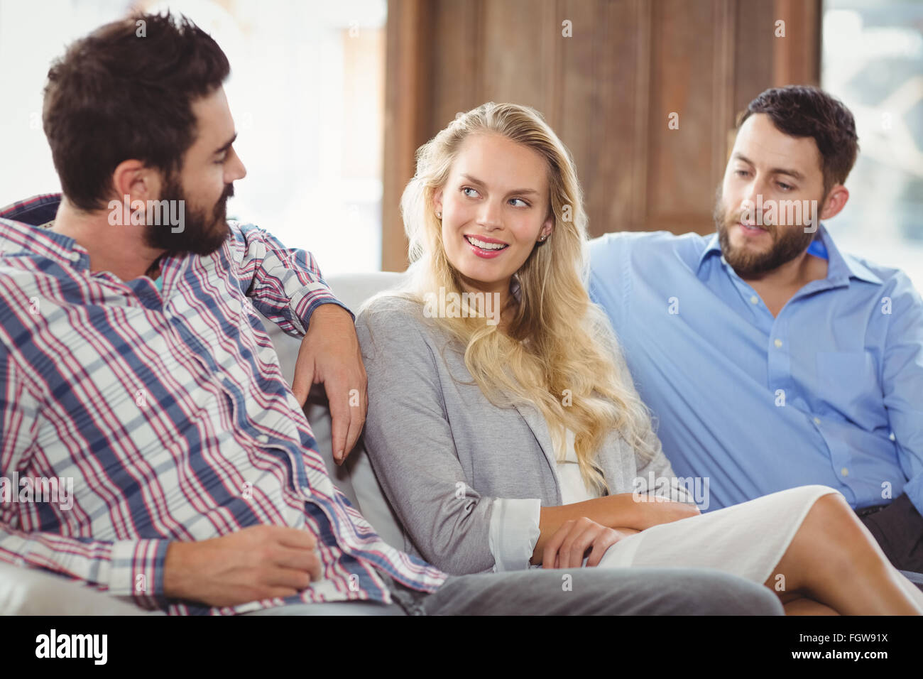 Young business people discussing Stock Photo - Alamy