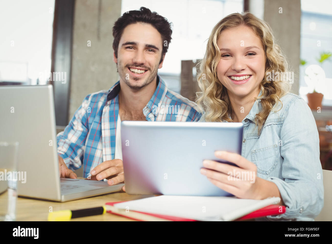 Portrait of happy colleagues in office Stock Photo - Alamy