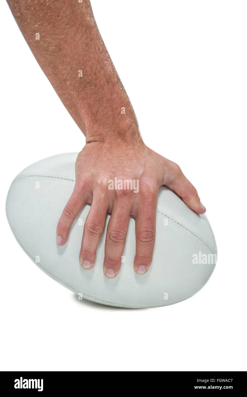Close-up of sports player holding ball Stock Photo - Alamy