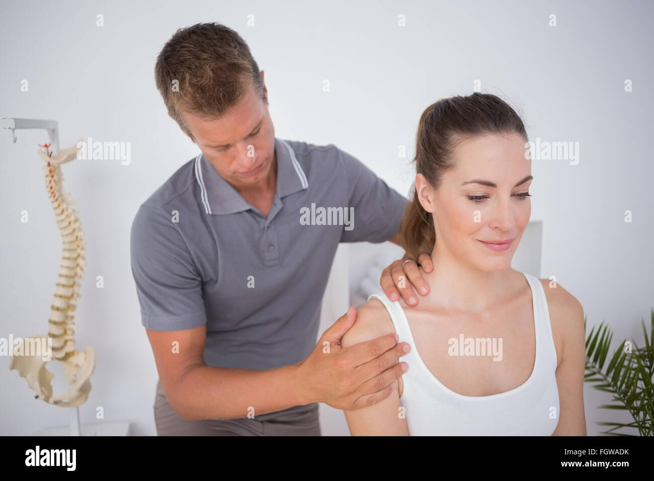 Doctor examining his patient arm Stock Photo - Alamy