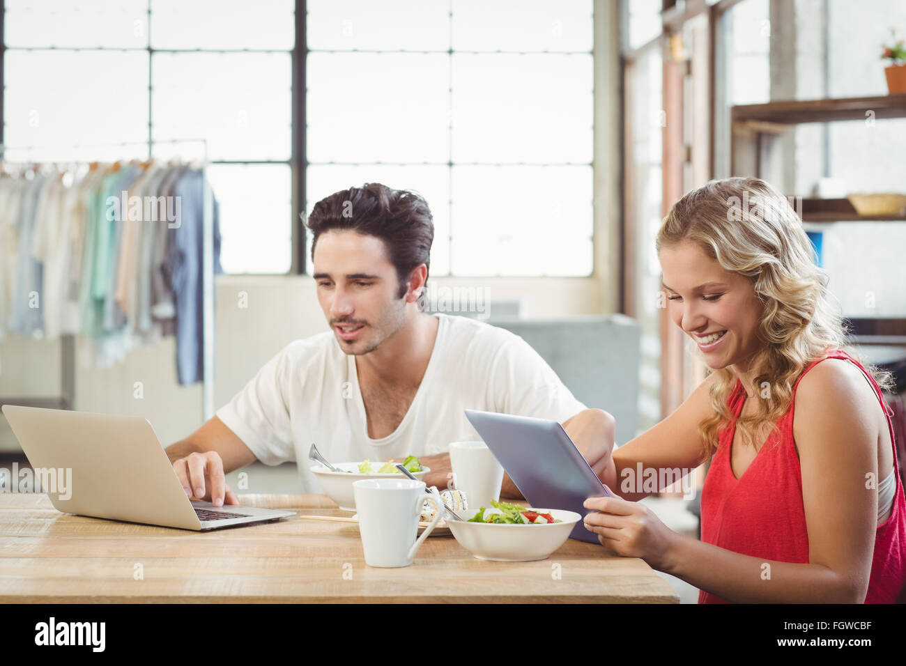 Business people using technologies in office Stock Photo - Alamy