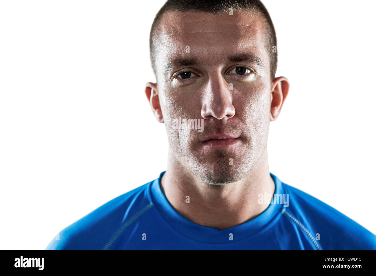 Confident sports player in blue jersey Stock Photo - Alamy