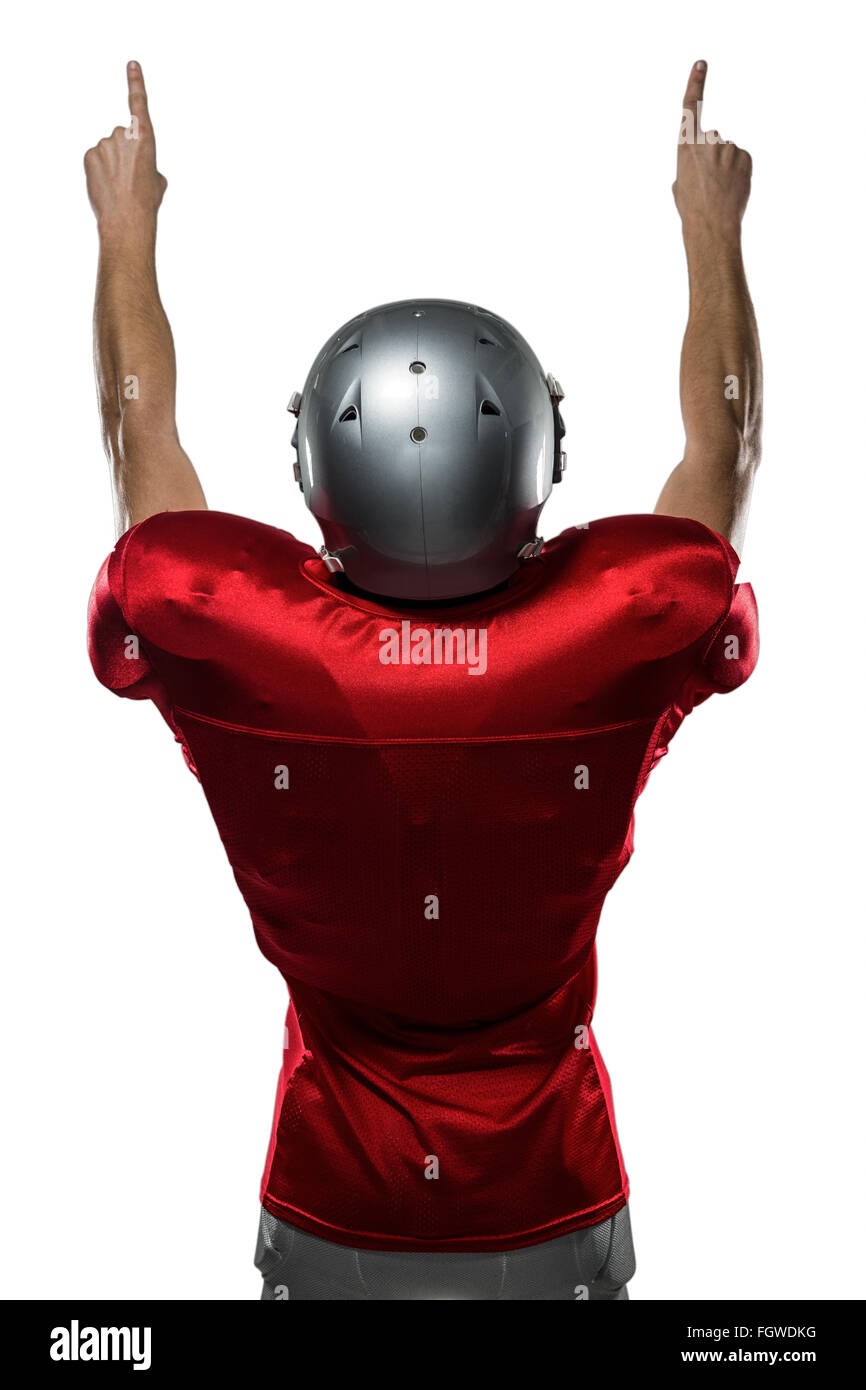 Rear view of American football player with arms raised Stock Photo - Alamy