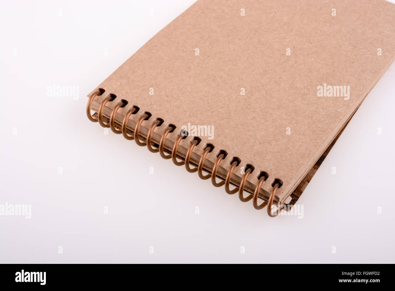 Spiral notebook on a white background Stock Photo - Alamy
