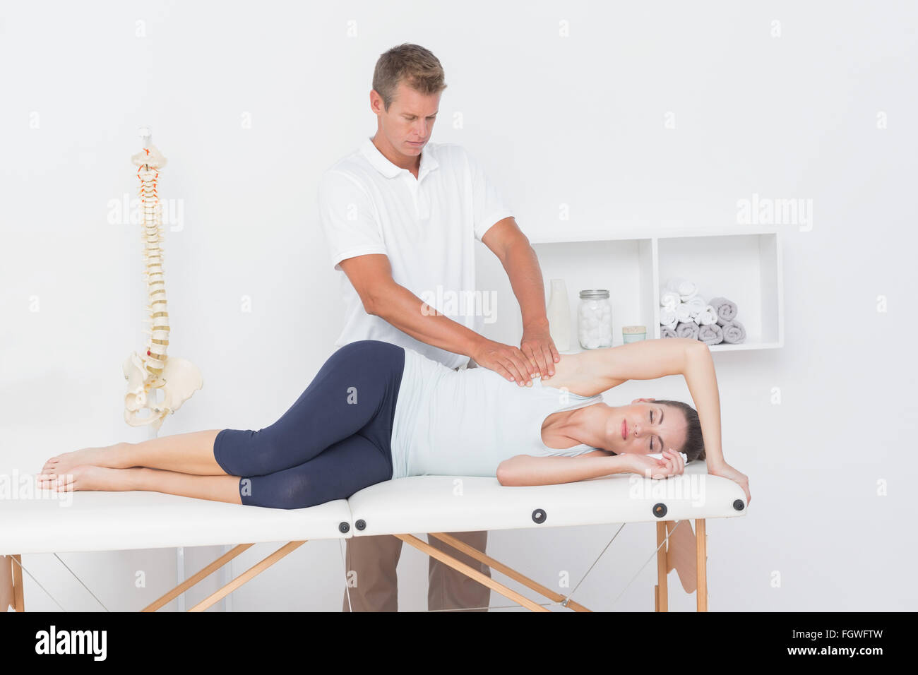 Doctor examining his patient arm Stock Photo - Alamy