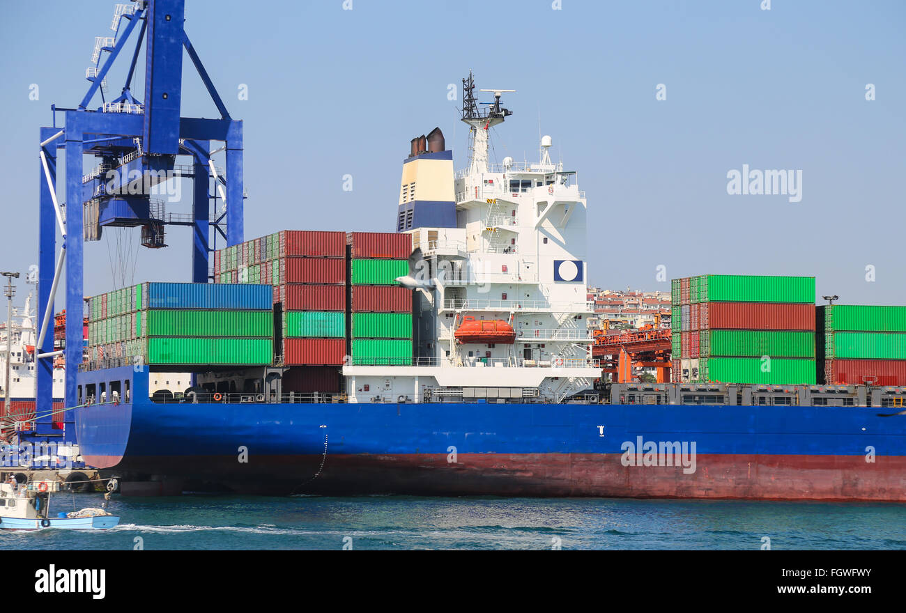 Container Ship is loading in a port Stock Photo - Alamy