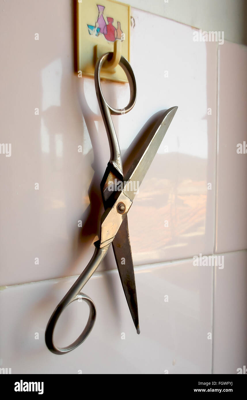 Hanging Scissors in the kitchen Stock Photo - Alamy