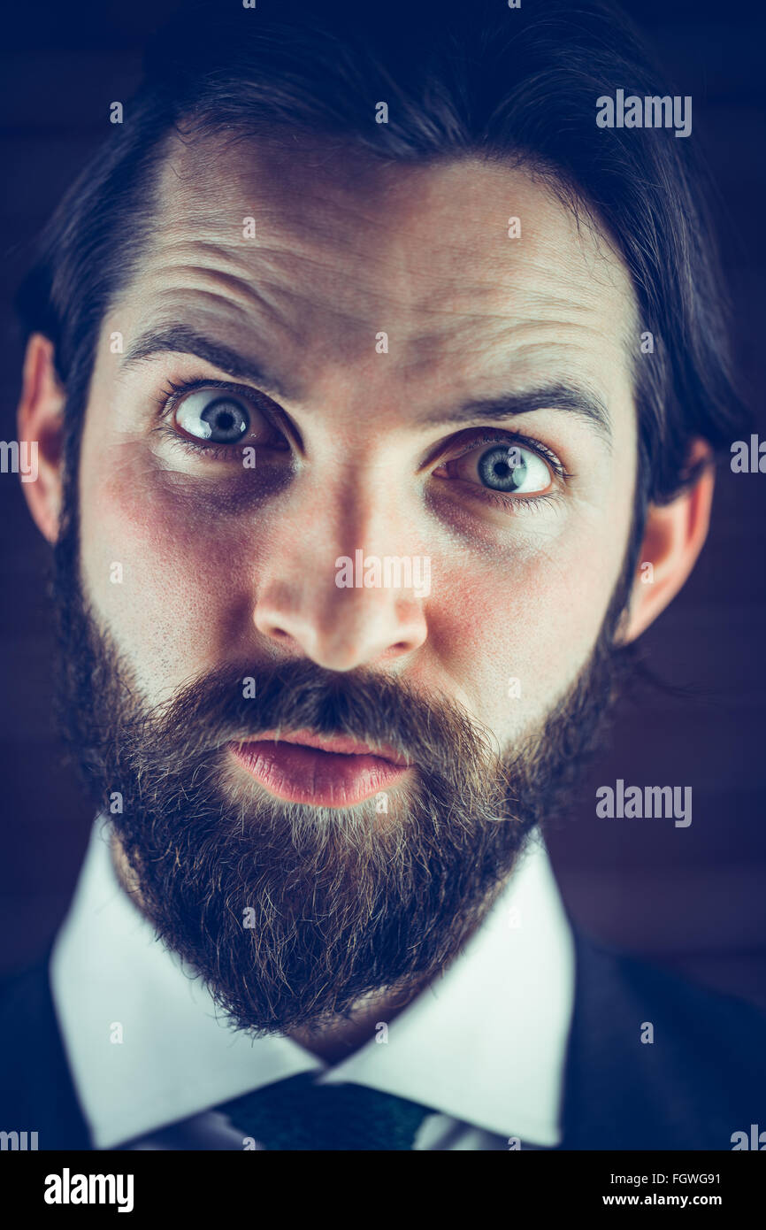 Portrait of angry hipster Stock Photo - Alamy