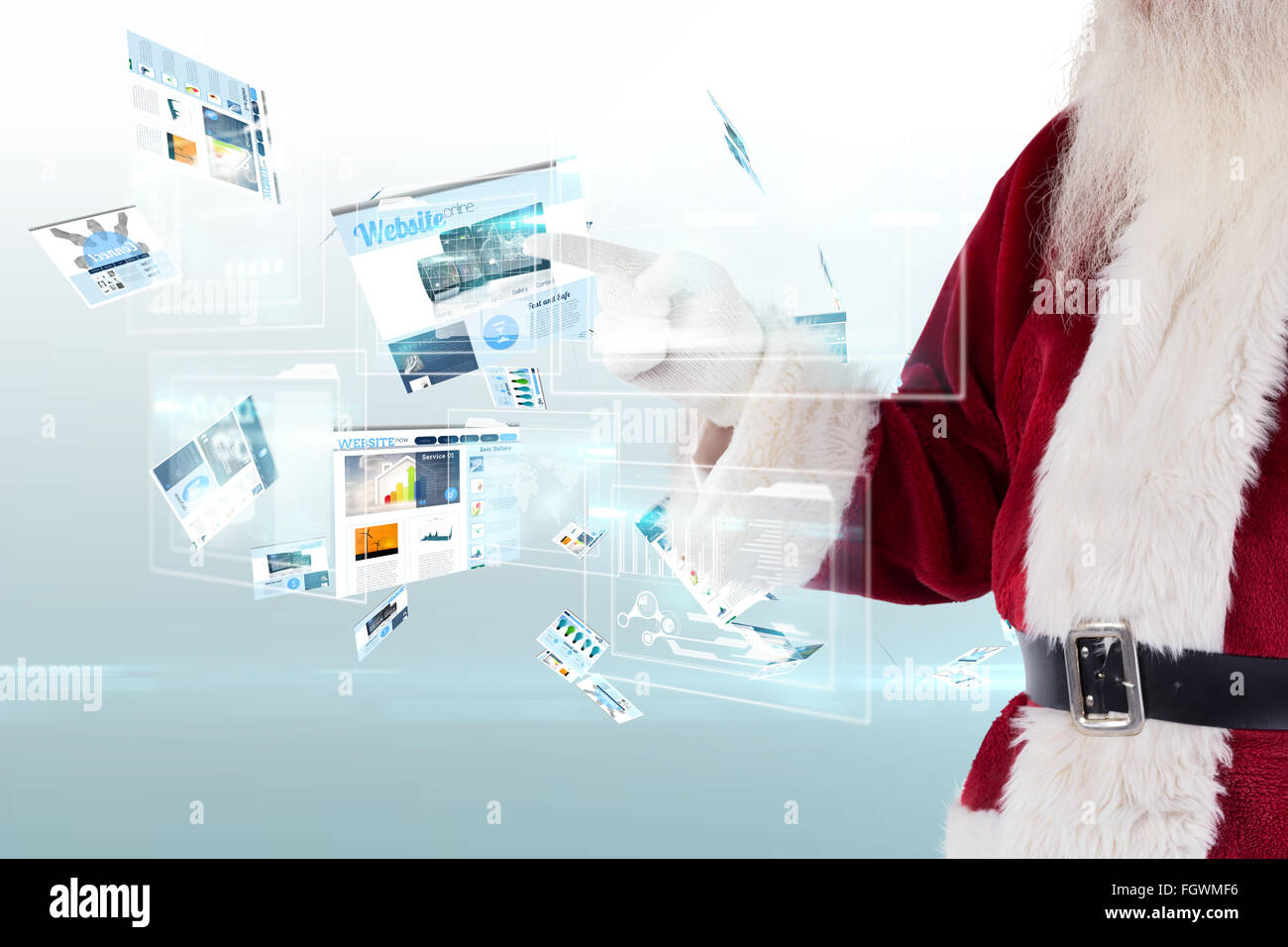 Composite image of santa claus points at something Stock Photo - Alamy